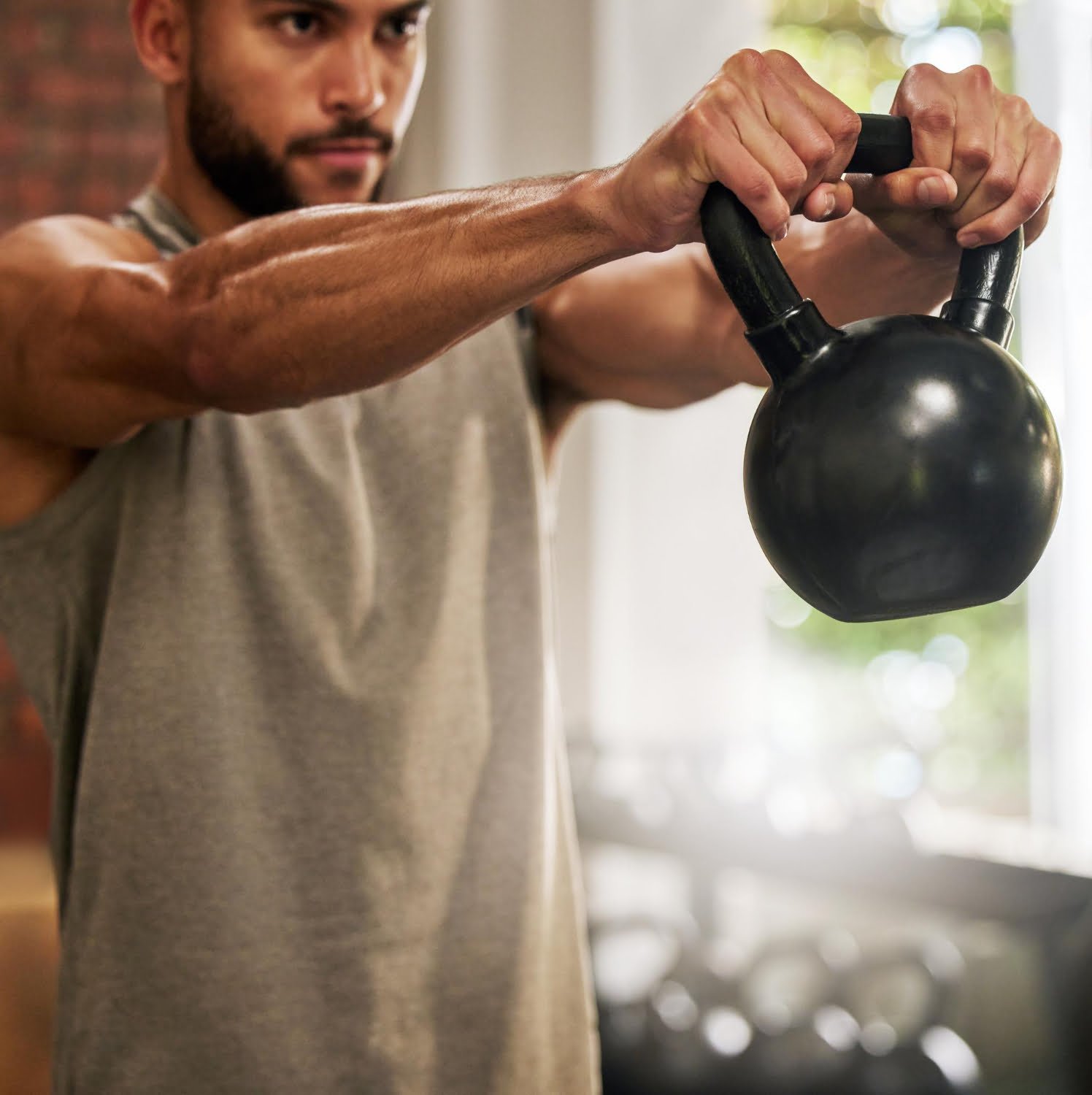 9 Biceps Kettlebell Exercises To Sculpt Stronger Arms - Workout Guru