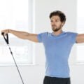 10 Effective Exercise Band Shoulder Workouts For Stronger Shoulders ...